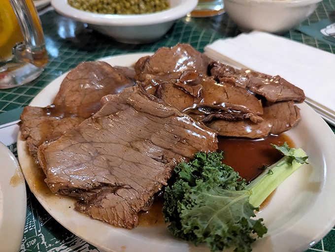 Behold the star attraction: roast beef so tender it practically surrenders to your fork. This isn't meat; it's a religious experience