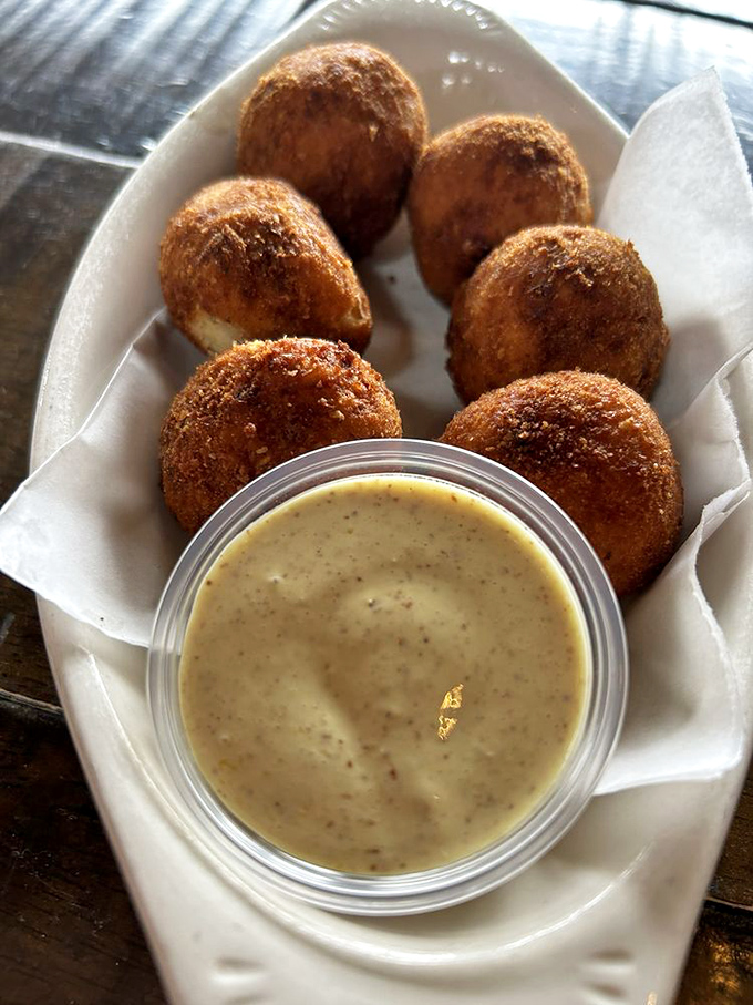 Golden-brown spheres of joy! These sauerkraut balls are what would happen if comfort food went to finishing school in Bavaria.