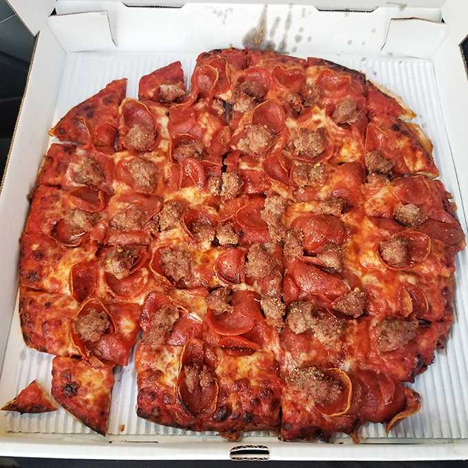 Behold the holy grail of Columbus pizza &ndash; pepperoni and sausage playing together like old friends on a perfectly crisp, party-cut canvas.