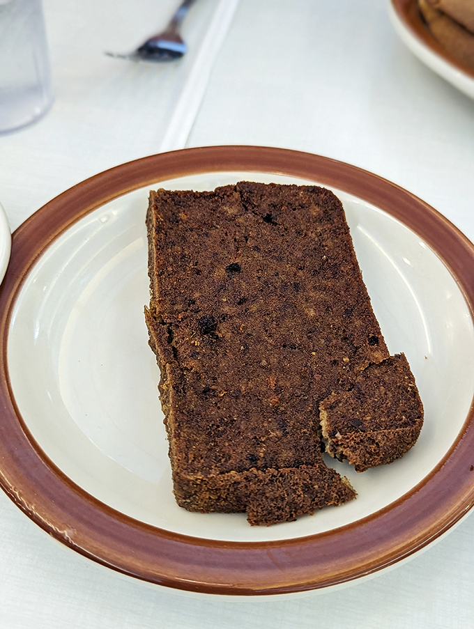 Pennsylvania Dutch ingenuity on a plate. This perfectly crisped scrapple represents generations of culinary wisdom and not a single wasted scrap. 