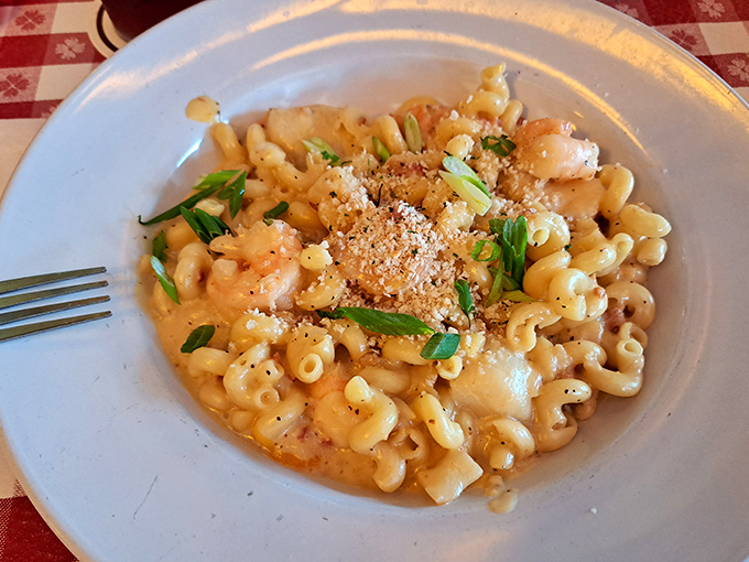 Behold the star attraction: seafood mac and cheese that makes ordinary comfort food look like it needs to step up its game.