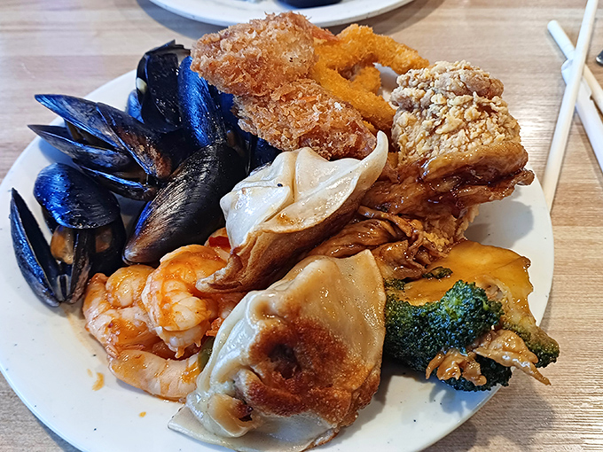 A plate that answers the eternal question: "Why choose one seafood when you can have them all?" Mussels, shrimp, and fried goodness unite.