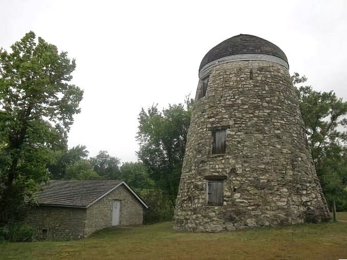 The historic Seppmann Mill stands as a stone sentinel overlooking the prairie, a testament to Minnesota's European heritage.