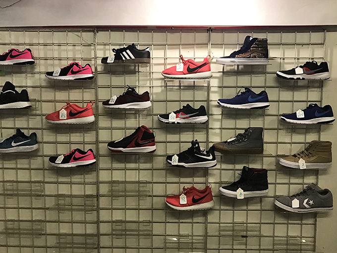 Sneakers arranged with museum-quality precision prove that footwear shopping can be both practical and oddly satisfying for everyone.