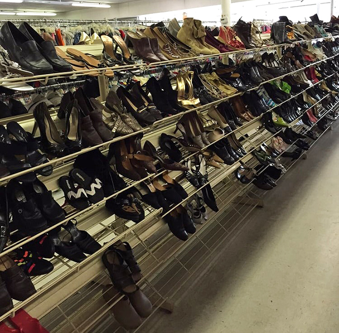 Shoe paradise or footwear purgatory? Depends on your patience level. The perfect pair of barely-worn boots is hiding somewhere in this leather landscape.