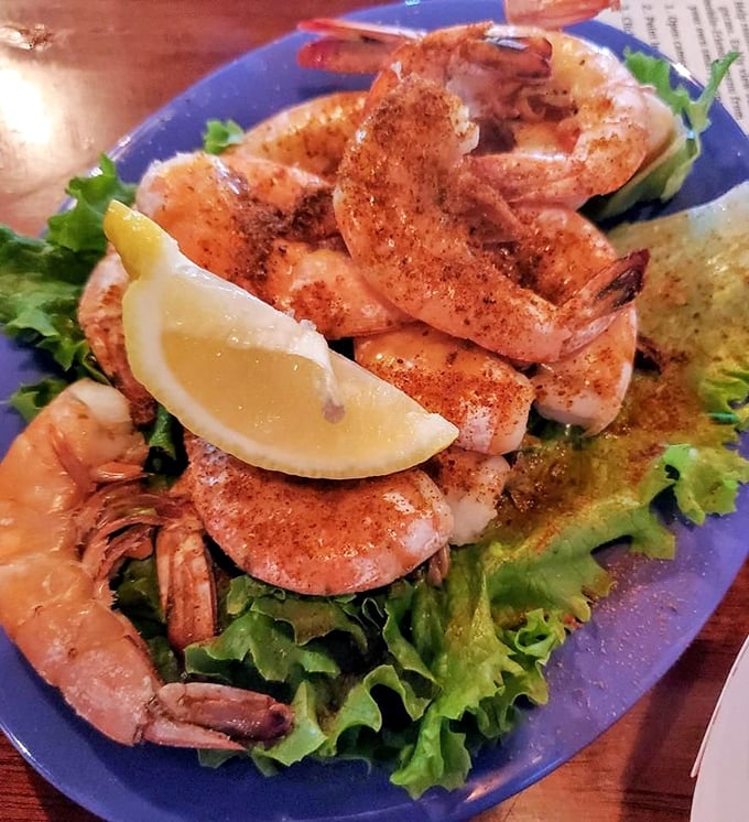 These plump, perfectly seasoned shrimp rest on a bed of crisp lettuce &ndash; a simple presentation that lets quality speak volumes.