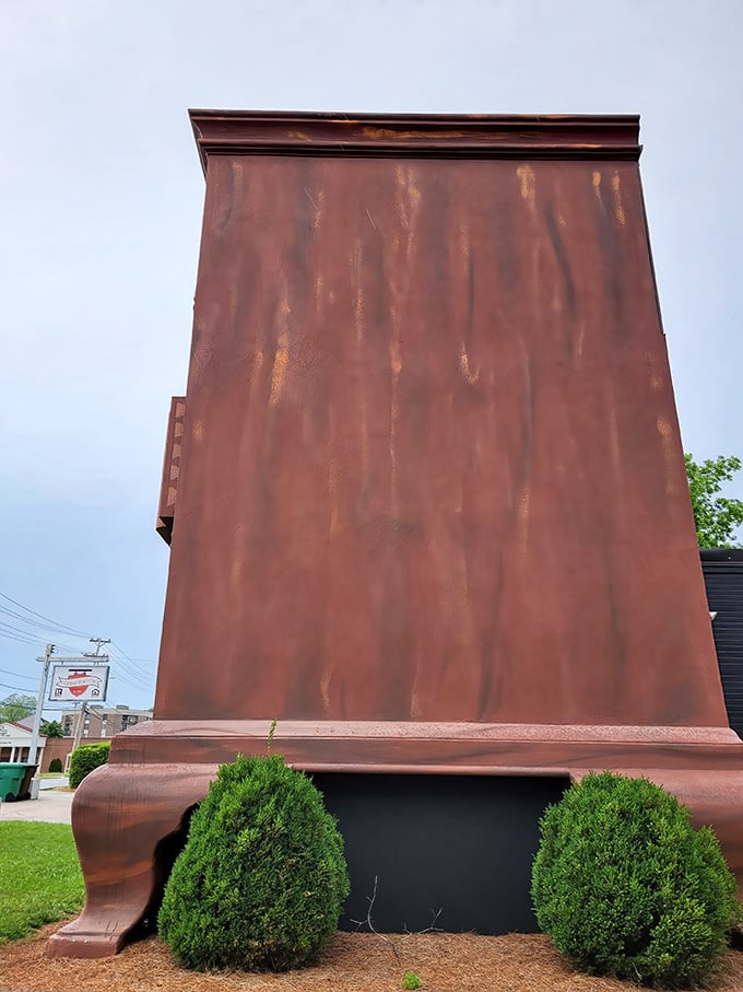 The side view reveals just how massive this wooden behemoth truly is. It's like someone hit the "enlarge" button on a perfectly normal dresser and forgot to stop.