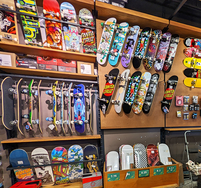 Santa Cruz skateboards line the walls like art, making you wonder if it's too late to become a cool skateboarding grandparent.
