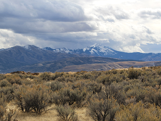 Snow-capped peaks provide the backdrop to your affordable Idaho adventure, no premium subscription required for these views.