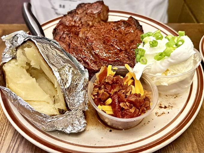 This isn't just a steak—it's a masterclass in oak-fired perfection. The loaded baked potato and pinquito beans aren't sidekicks; they're essential supporting characters in this meaty drama.