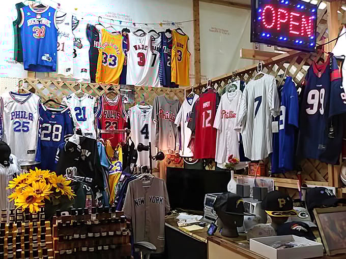 Sports jerseys spanning decades of Philadelphia pride hang like a timeline of our collective athletic hopes and occasional heartbreaks.
