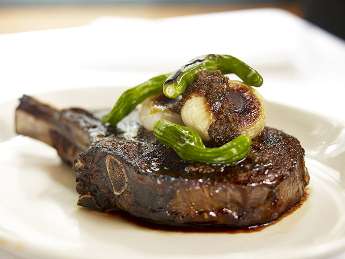 A perfectly seared bone-in masterpiece topped with shishito peppers that's worth every minute of the post-meal food coma.