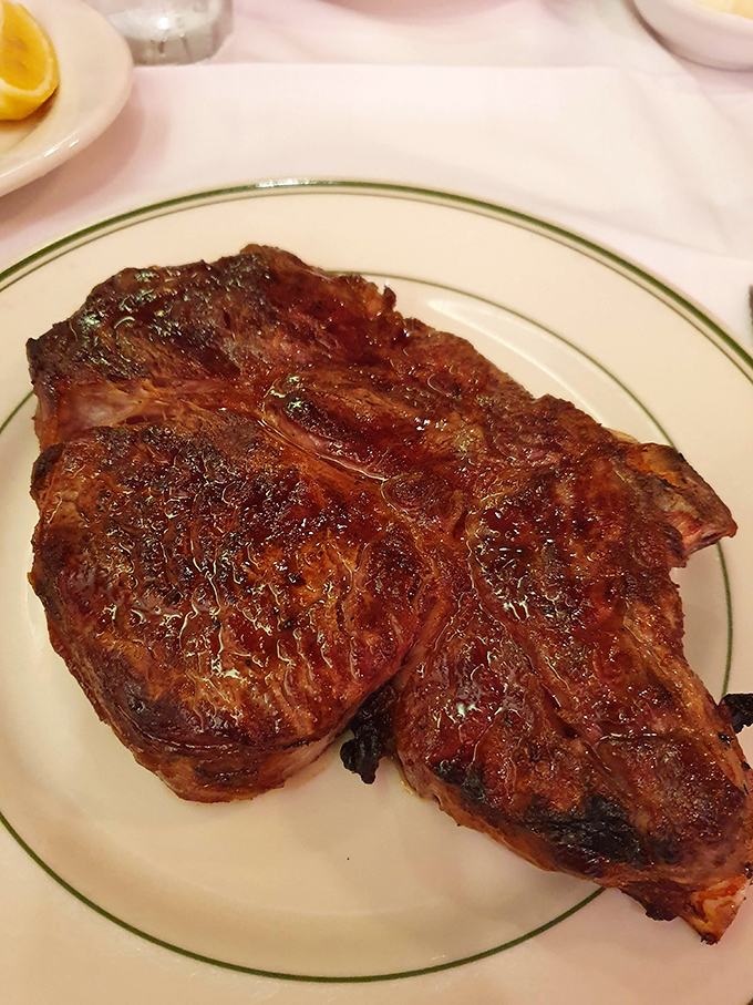 This isn't just a steak; it's a masterclass in dry-aging and perfect cooking. The crust speaks of fire; the interior whispers of patience.
