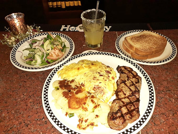 Behold the main event: perfectly grilled steak meeting fluffy eggs in breakfast matrimony that actually works.
