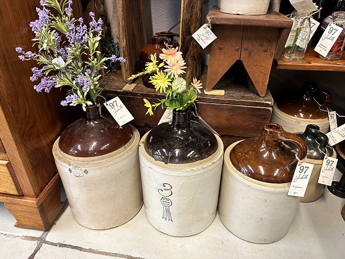 These stoneware jugs aren't just containers – they're storytellers with price tags. Imagine the moonshine, maple syrup, or molasses they once held.