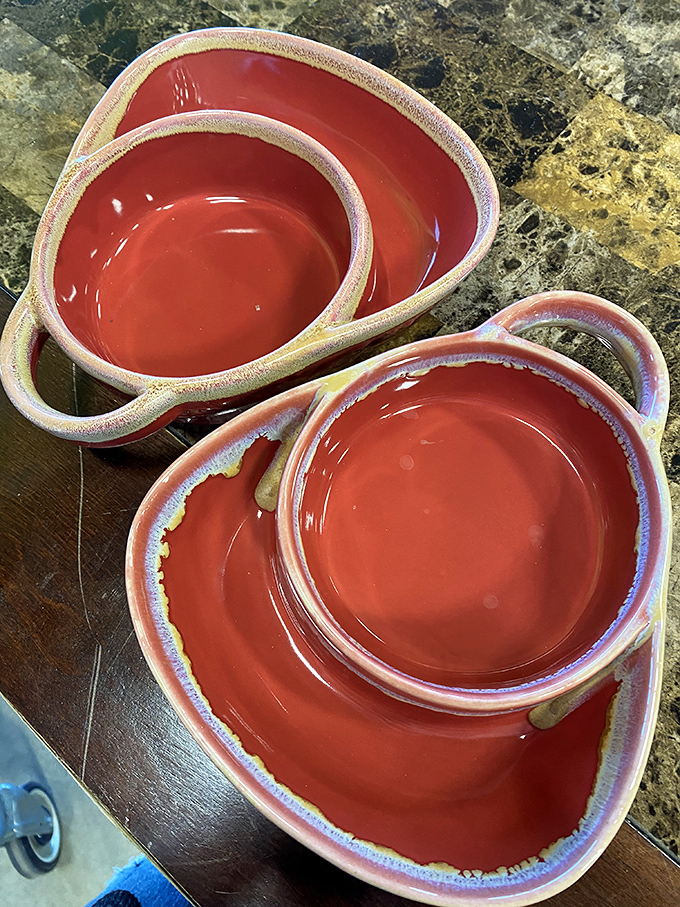 These coral-hued ceramic bowls once graced someone else's table. Now they await a second act in your kitchen, ready to serve everything from pasta to popcorn.