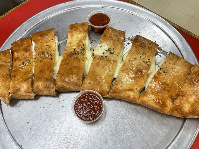 Handwritten menu boards&mdash;the universal sign of a place that's too busy making incredible food to bother with digital displays or fancy typography.