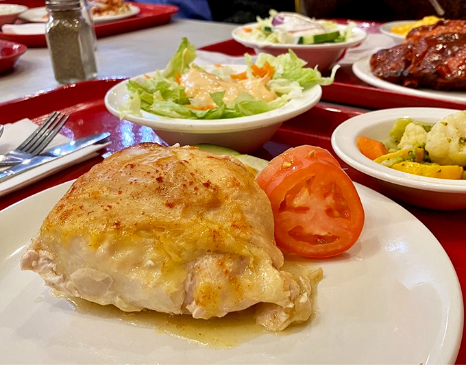The legendary stuffed chicken arrives like a golden promise kept. One bite of this cheese-topped masterpiece and you'll understand why people cross county lines.