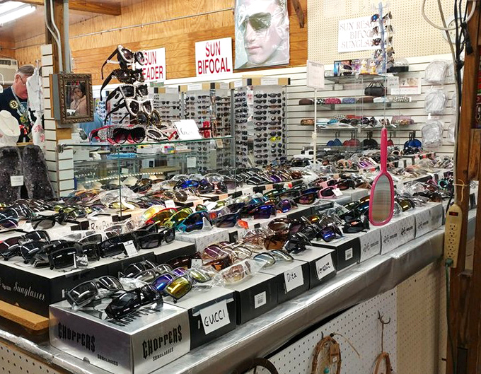 Sunglasses paradise! Where knockoffs and name brands coexist peacefully, and everyone leaves looking mysteriously cooler than when they arrived.