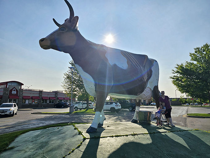 Sunbeams play across Bessie's impressive silhouette, creating the perfect backdrop for the quintessential American road trip memory.