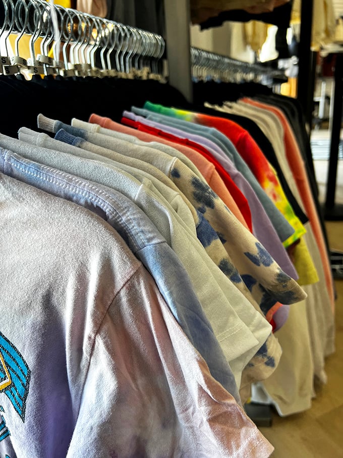Rows of t-shirts proving that someone else's impulse buy can become your new favorite weekend wear essential treasure.