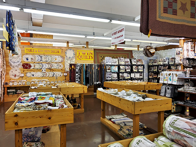 Rustic wooden bins overflow with kitchen treasures &ndash; proof that "mountain chic" doesn't require mountain-sized prices.