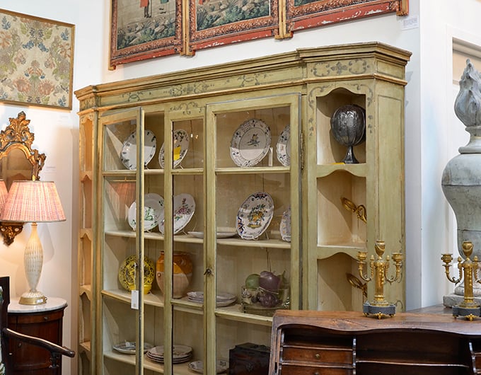 This isn't just a cabinet&mdash;it's a portal to elegant dinner parties past, displaying china that's witnessed more interesting conversations than most people.