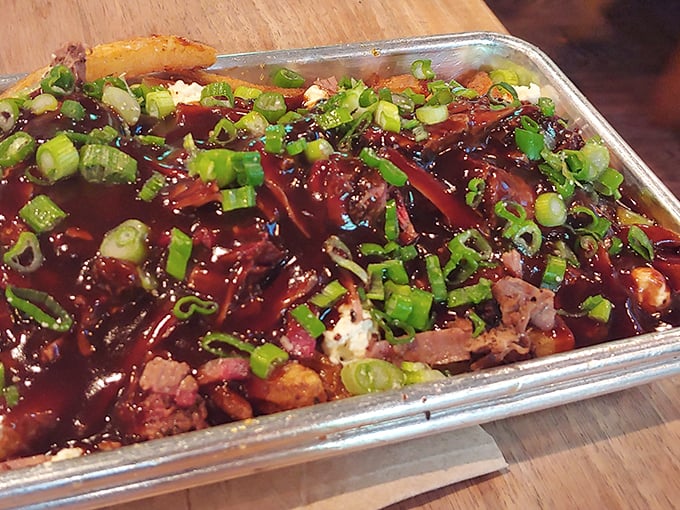 Glistening with sauce and topped with fresh scallions, this meat medley isn't just food &ndash; it's edible artwork that makes your taste buds stand at attention.