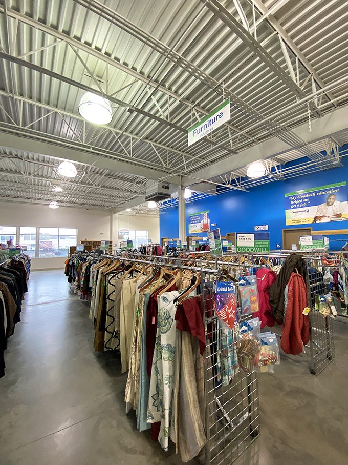 The clothing section rivals boutiques in organization but beats them handily in price. That green "Furniture" sign in the distance? That's the siren call for DIY enthusiasts.
