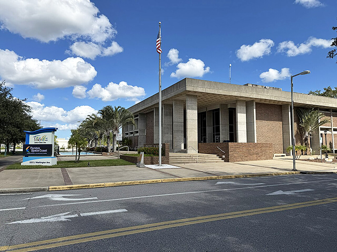 Titusville City Hall stands proudly under Florida's impossibly blue skies, a reminder that local government doesn't have to be housed in soul-crushing architecture.