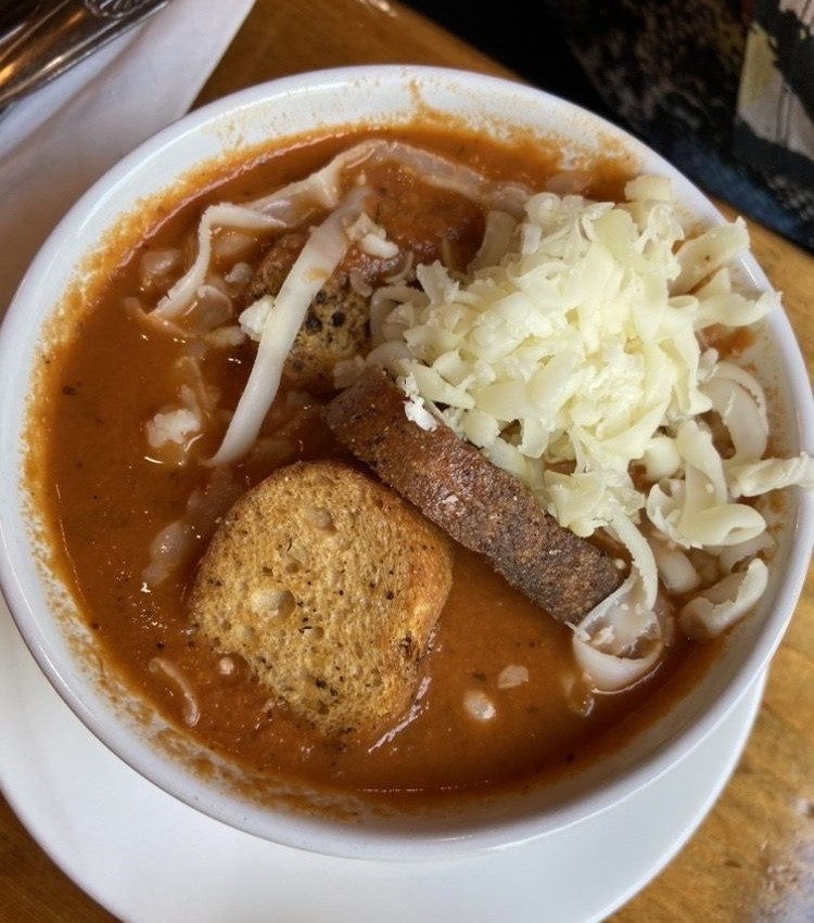 This isn't just soup&mdash;it's a bowl of comfort topped with melted cheese that makes you want to write poetry or, at minimum, audibly sigh with contentment.