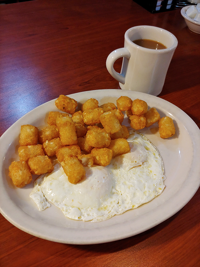 Golden potato perfection meets sunny-side-up simplicity. These tater tots aren't just crispy&mdash;they're what potato dreams are made of.