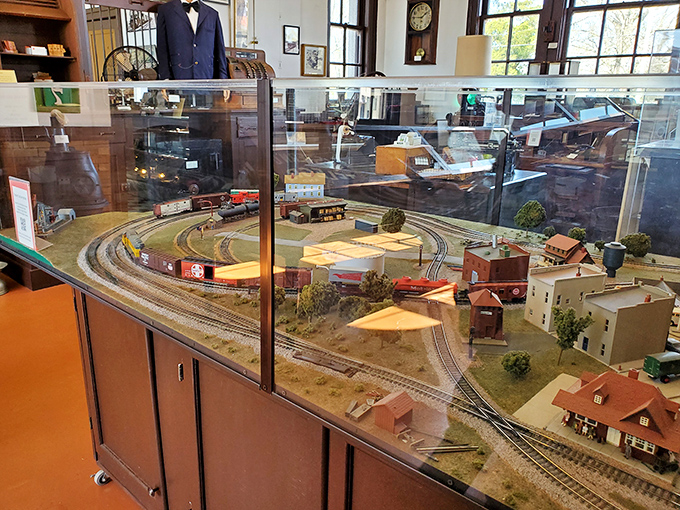 This detailed model train display recreates a miniature world where the trains always run on time. Notice the tiny buildings&mdash;each one representing a slice of small-town Americana.