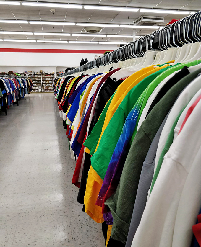 The t-shirt section stretches into infinity, a kaleidoscope of colors where someone else's vacation souvenir becomes your new favorite shirt.