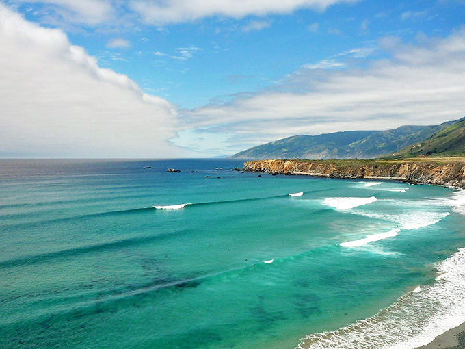 Fifty shades of blue that no paint store could ever replicate. The Pacific shows its true colors at Sand Dollar Beach.