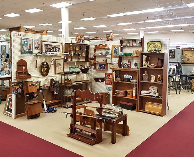 This booth is like someone's attic organized by a museum curator &ndash; wooden shelves holding memories for sale, each with its own backstory.