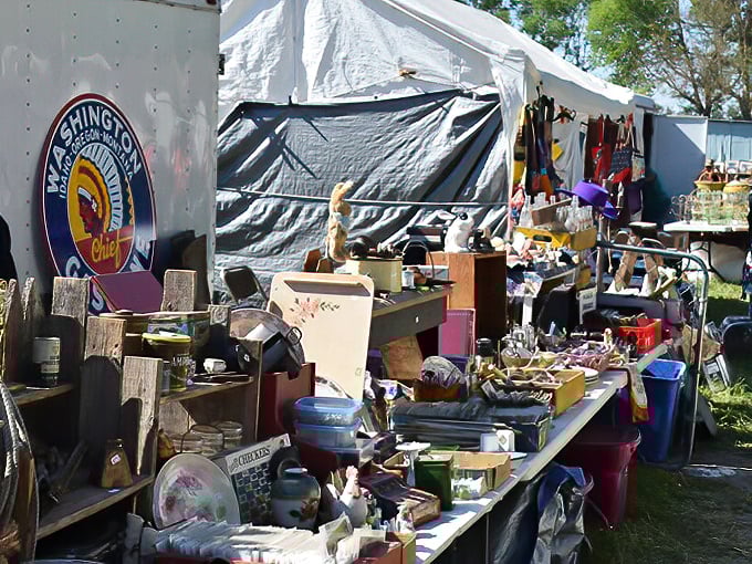 Organized chaos at its finest. One vendor's table overflows with potential discoveries&mdash;each item waiting for someone to recognize its value.