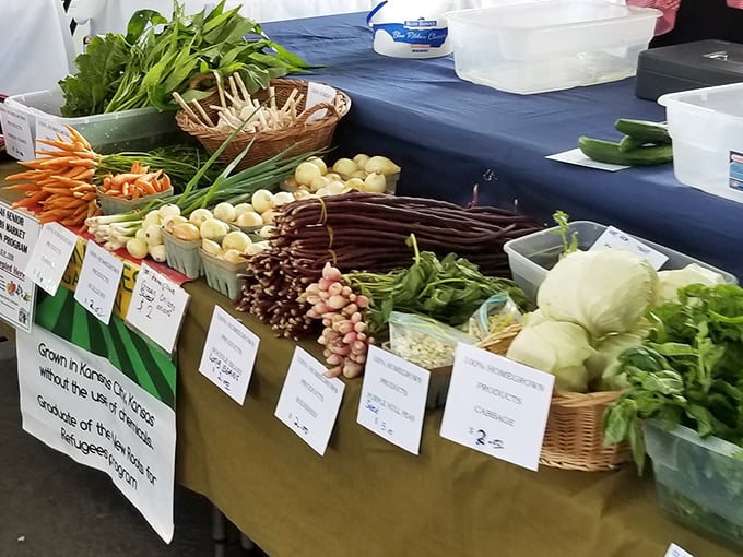 A farmer's palette of fresh vegetables arranged with care. Those radishes and turnips didn't travel across continents to meet you&mdash;they're practically neighbors.