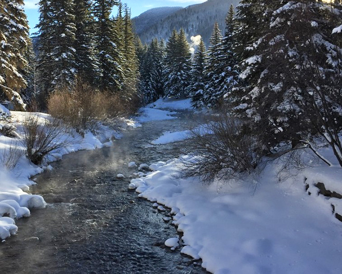 Winter transforms Gore Creek into a snow-globe scene straight out of a holiday card&mdash;minus the shaking, plus the crisp mountain air.