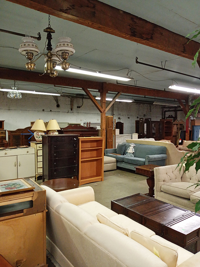 Living room vignettes that could star in a vintage sitcom. That teal sofa has definitely seen some family game nights in its day.