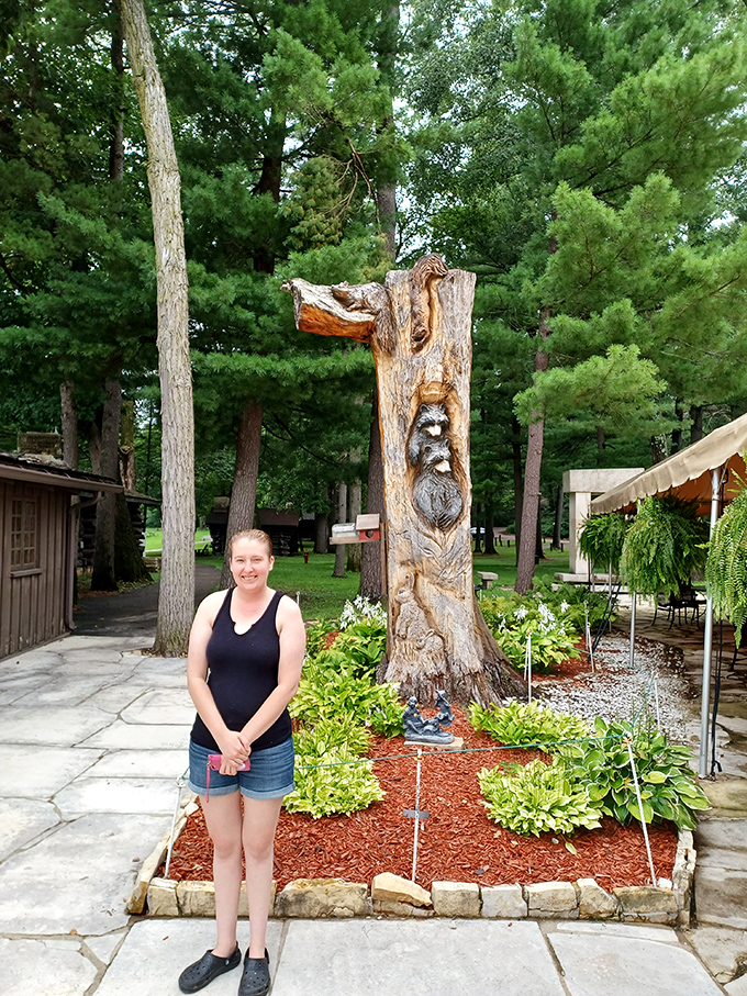 Standing before this carved wooden sentinel feels like discovering a secret art installation hidden in plain Illinois sight.