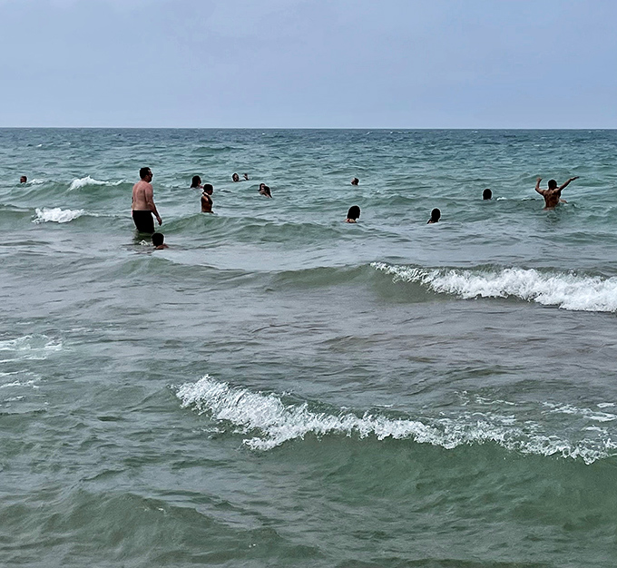 Lake Michigan's waves offer the perfect combination of refreshment and gentle adventure&mdash;no shark worries included!