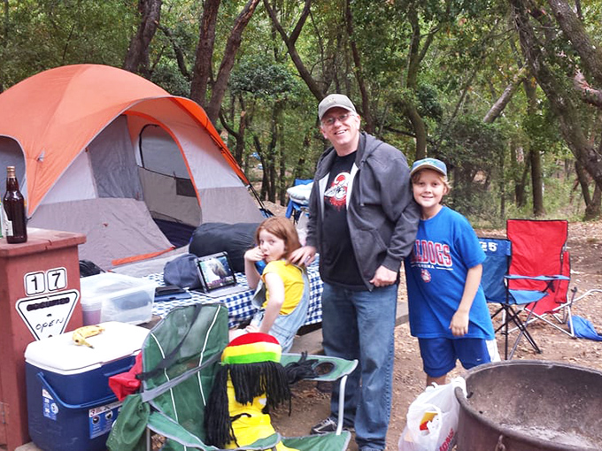 Family camping memories in the making &ndash; where s'mores, ghost stories, and quality time replace screen time under the oak canopy.