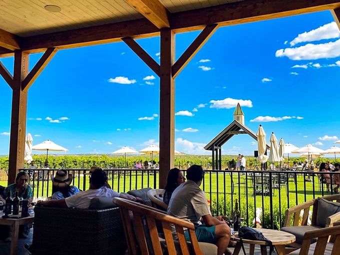 The perfect Texas afternoon: comfortable seating, vineyard views, and wine glasses that somehow never seem to stay empty for long.