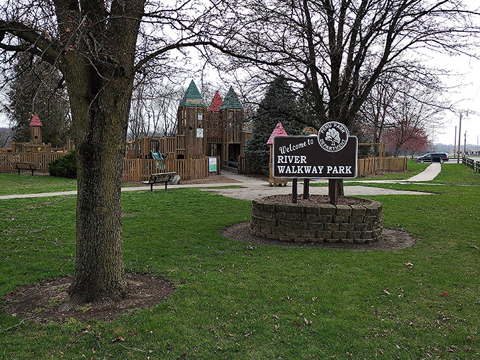 River Walkway Park welcomes little adventurers with a wooden castle playground that would make medieval architects proud. Childhood imagination finds its perfect backdrop here.