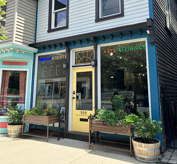 The Wayne County Arts Alliance brings creative energy to Honesdale with its cheerful yellow door and welcoming planters—proof that culture doesn't require big-city price tags.