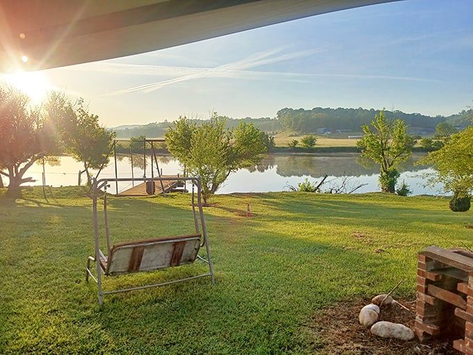 Sunrise over still waters with a porch swing waiting &ndash; this lakeside spot offers the kind of morning view that makes you forgive your alarm clock for existing.