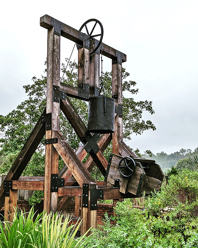 Medieval meets botanical in this wooden trebuchet—because sometimes gardens need conversation pieces that could theoretically launch a pumpkin.