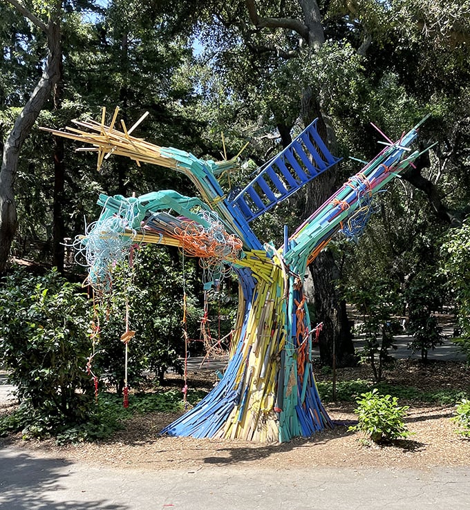 This whimsical bird sculpture adds unexpected bursts of color to the landscape, because apparently nature needed backup dancers.