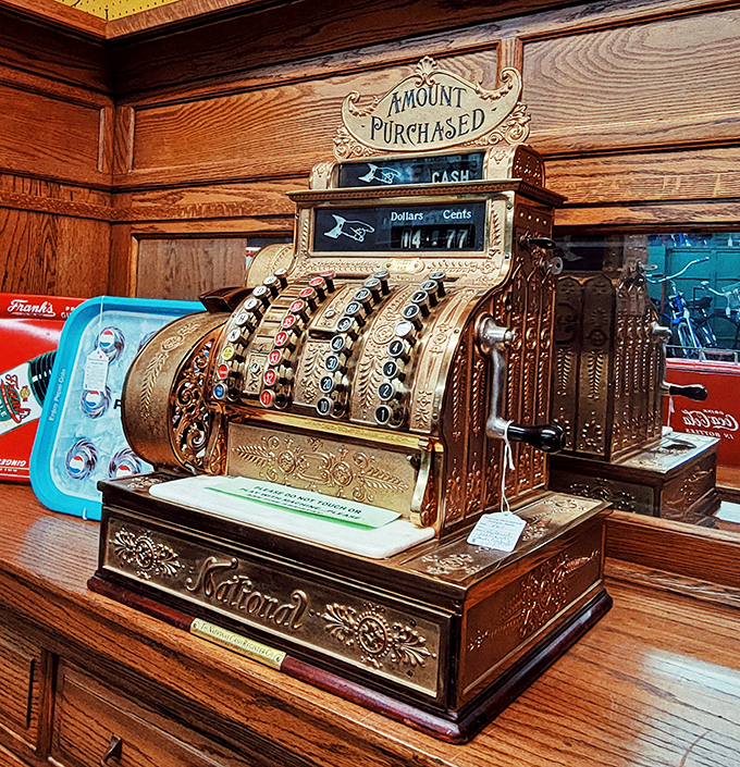 This gleaming National Cash Register isn't just counting dollars&mdash;it's a brass-and-nickel time machine from when "ringing it up" was a mechanical symphony.